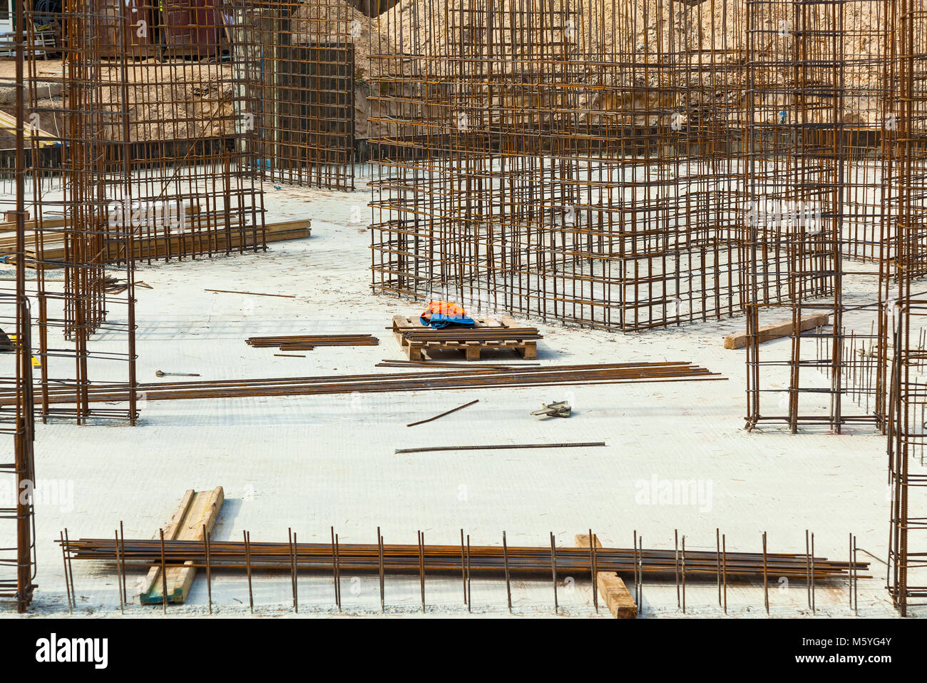 Construction workers fabricating steel reinforcement bar at the ...