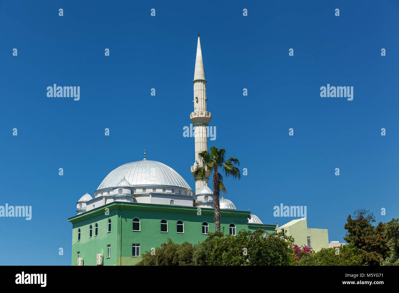 A pile of wooden boxes against the background of the mosque,Mosque ...