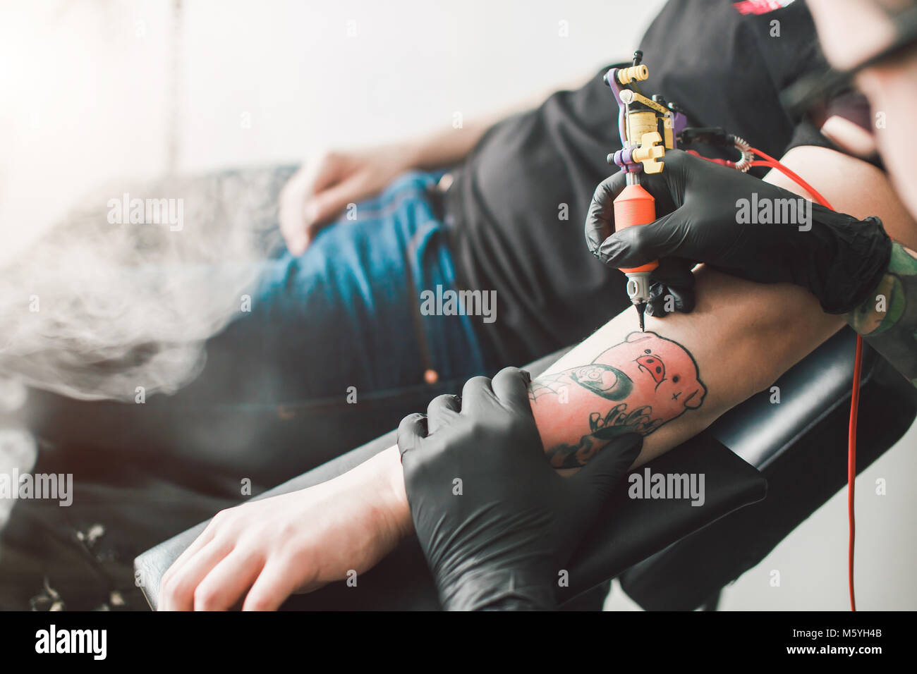 Creating a tattoo hi-res stock photography and images - Alamy