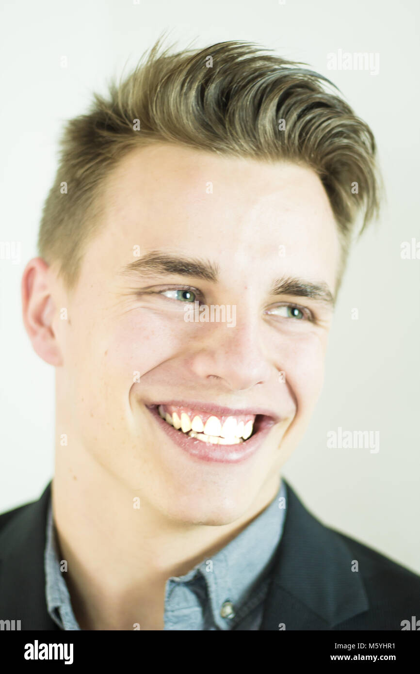 young businessman smiling Stock Photo - Alamy