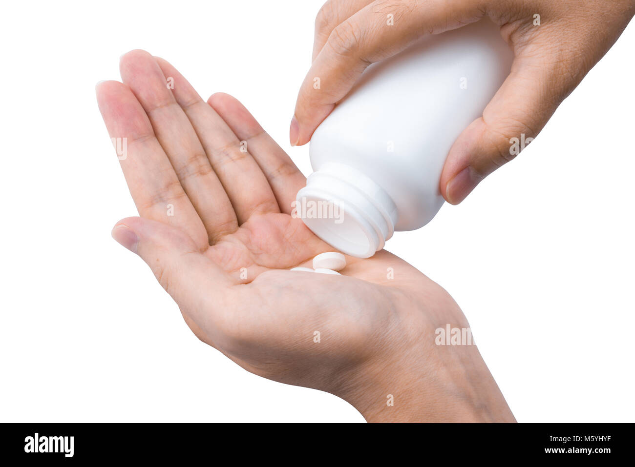 Hand holding vitamin tablets hi-res stock photography and images - Alamy