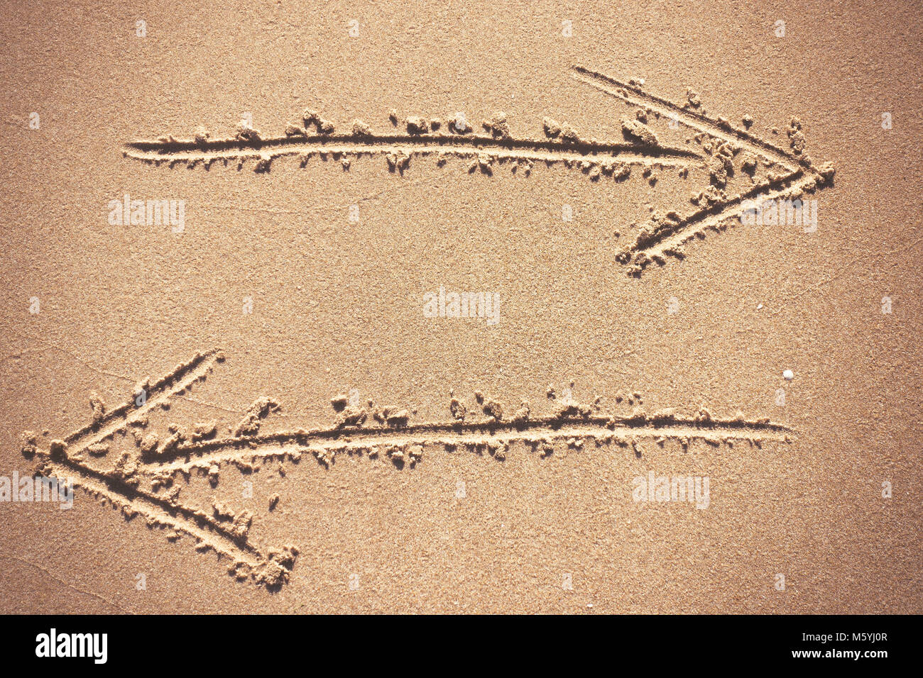 Drawing in sand background hi-res stock photography and images - Alamy