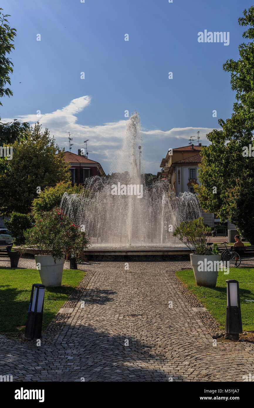 town fountain, front view with meadow Stock Photo - Alamy