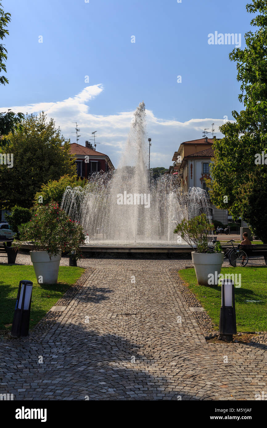 town fountain, front view with meadow Stock Photo - Alamy