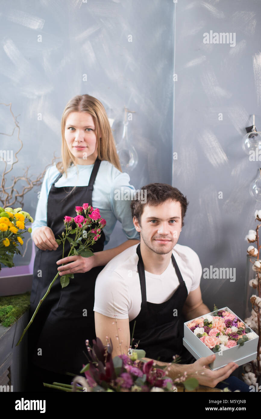 two students having practice as florists Stock Photo - Alamy