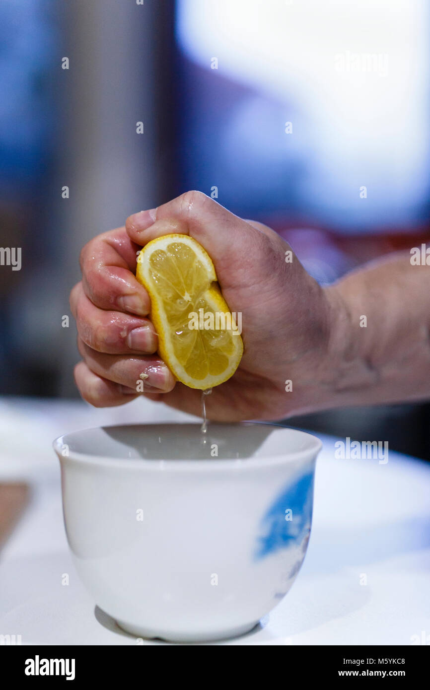 Man orange hand squeeze hi-res stock photography and images - Alamy