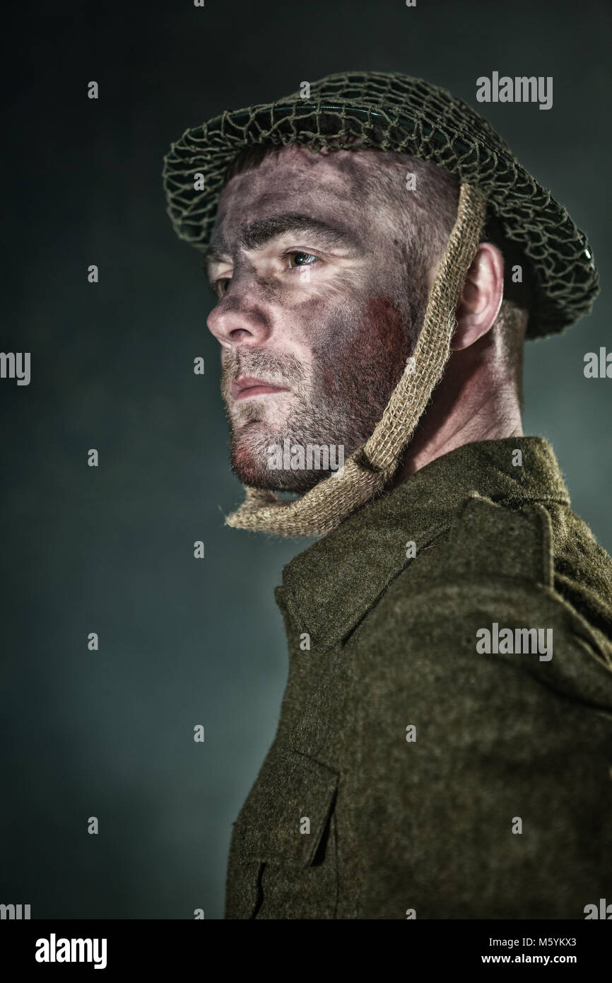 World War Two soldier in authentic battlefield tunic and ww2 helmet in ...