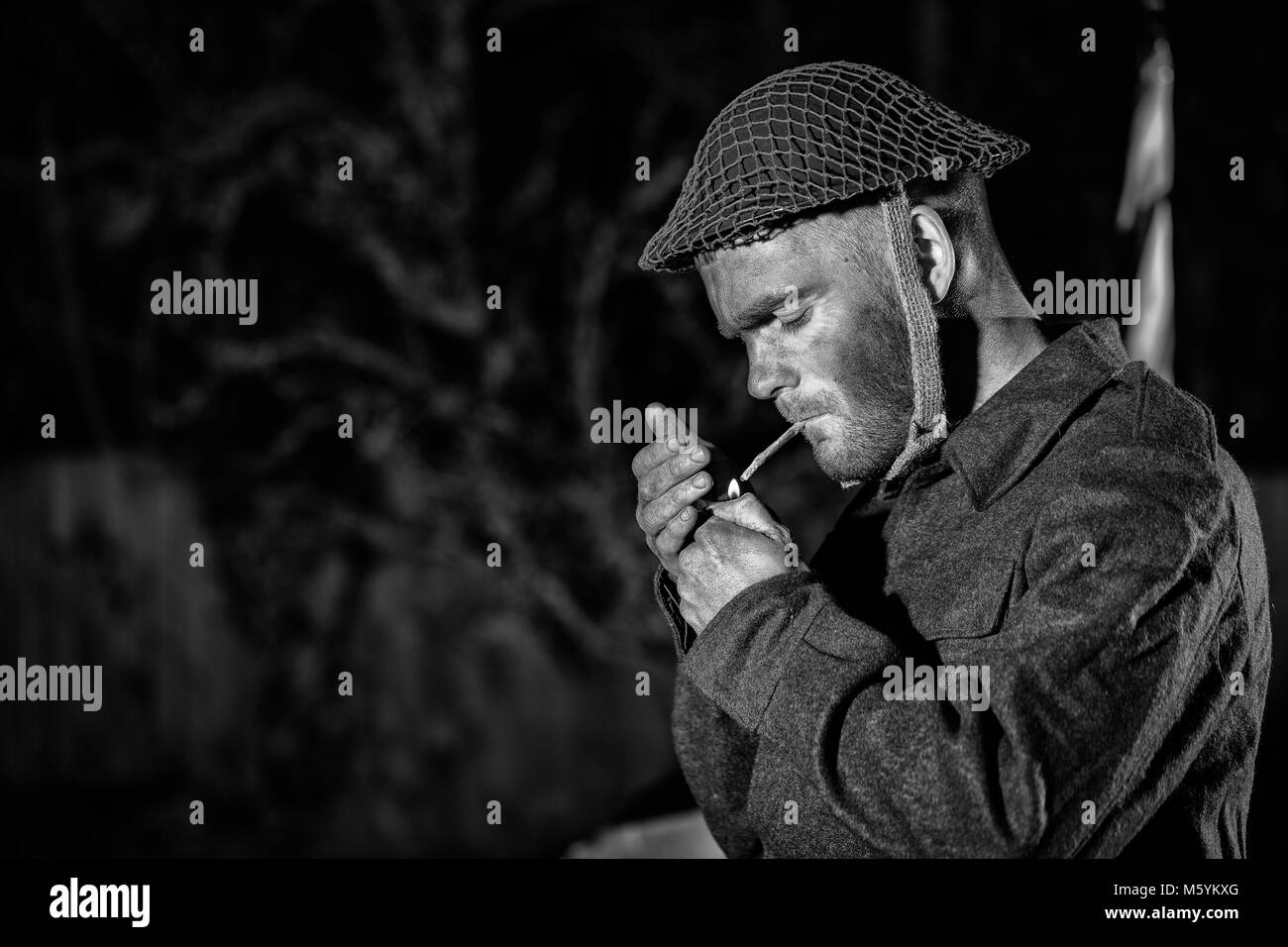 World War Two soldier in authentic battlefield tunic and ww2 helmet in ...