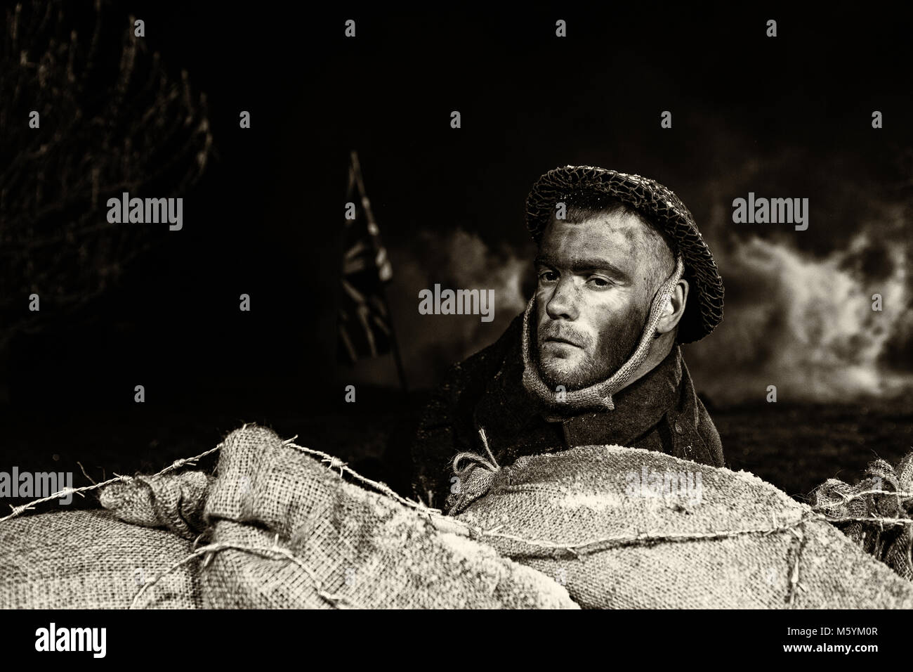 World War Two soldier in authentic battlefield tunic and ww2 helmet in ...