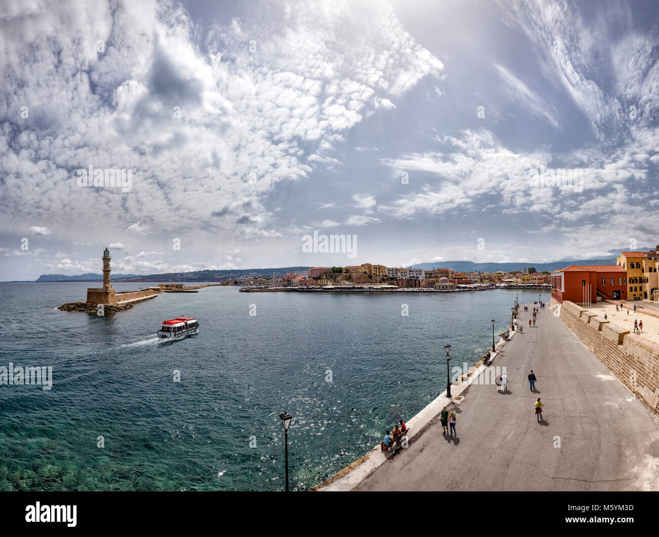 The lighthouse at the entrance of the port, Chania, Greece Stock Photo ...