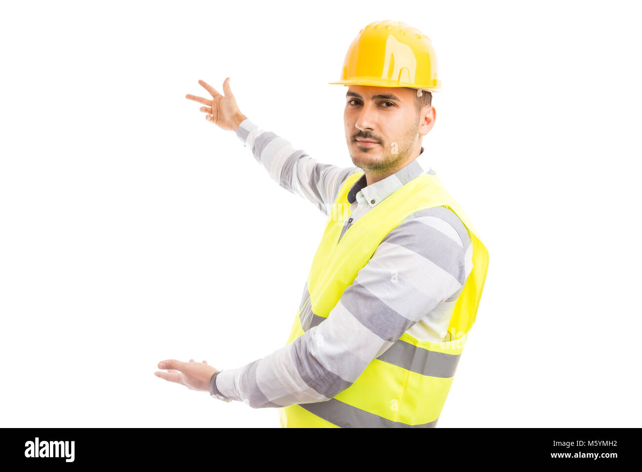 Handsome engineer or construction worker presenting white empty ...