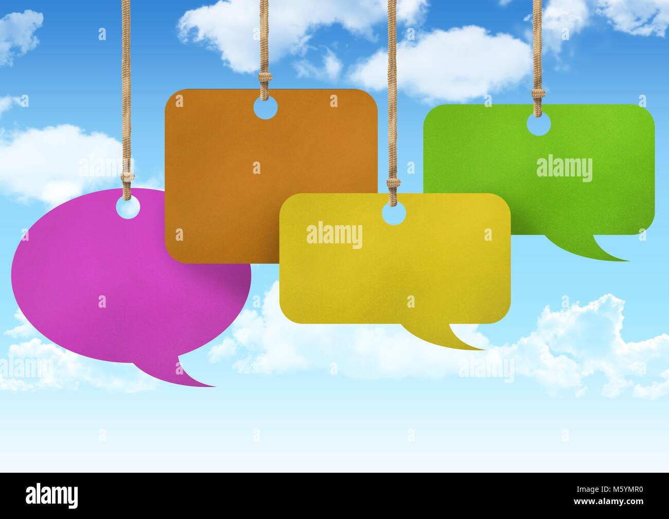 Hanging paper speech bubbles and sky background Stock Photo - Alamy