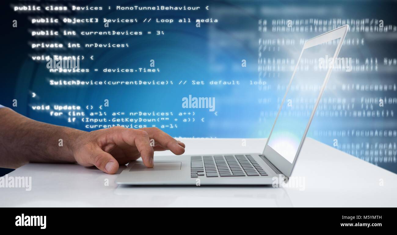 Hand typing coding text on laptop Stock Photo - Alamy