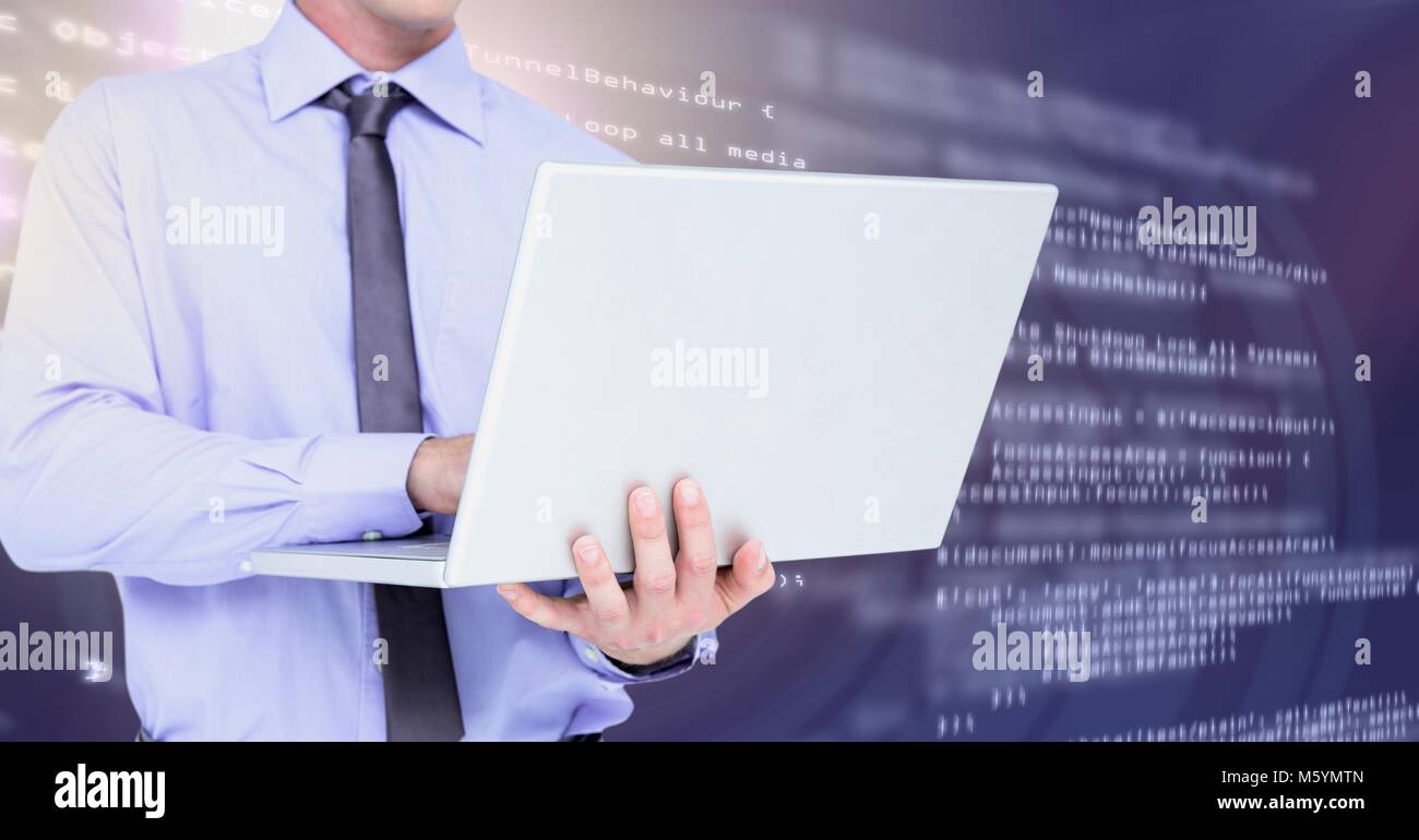 Man typing coding text on laptop Stock Photo - Alamy