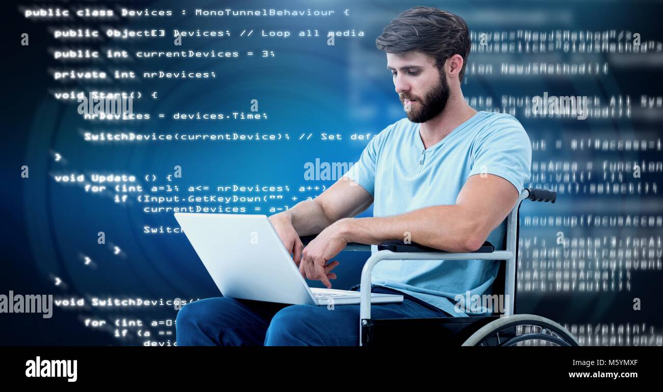 Disabled man typing coding text in wheelchair Stock Photo - Alamy