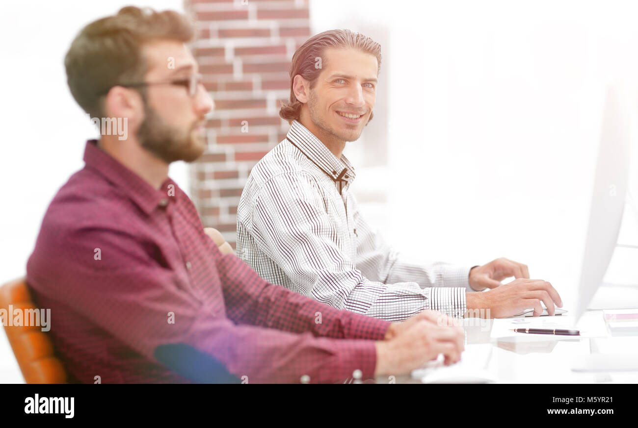 two employees work in the office Stock Photo - Alamy