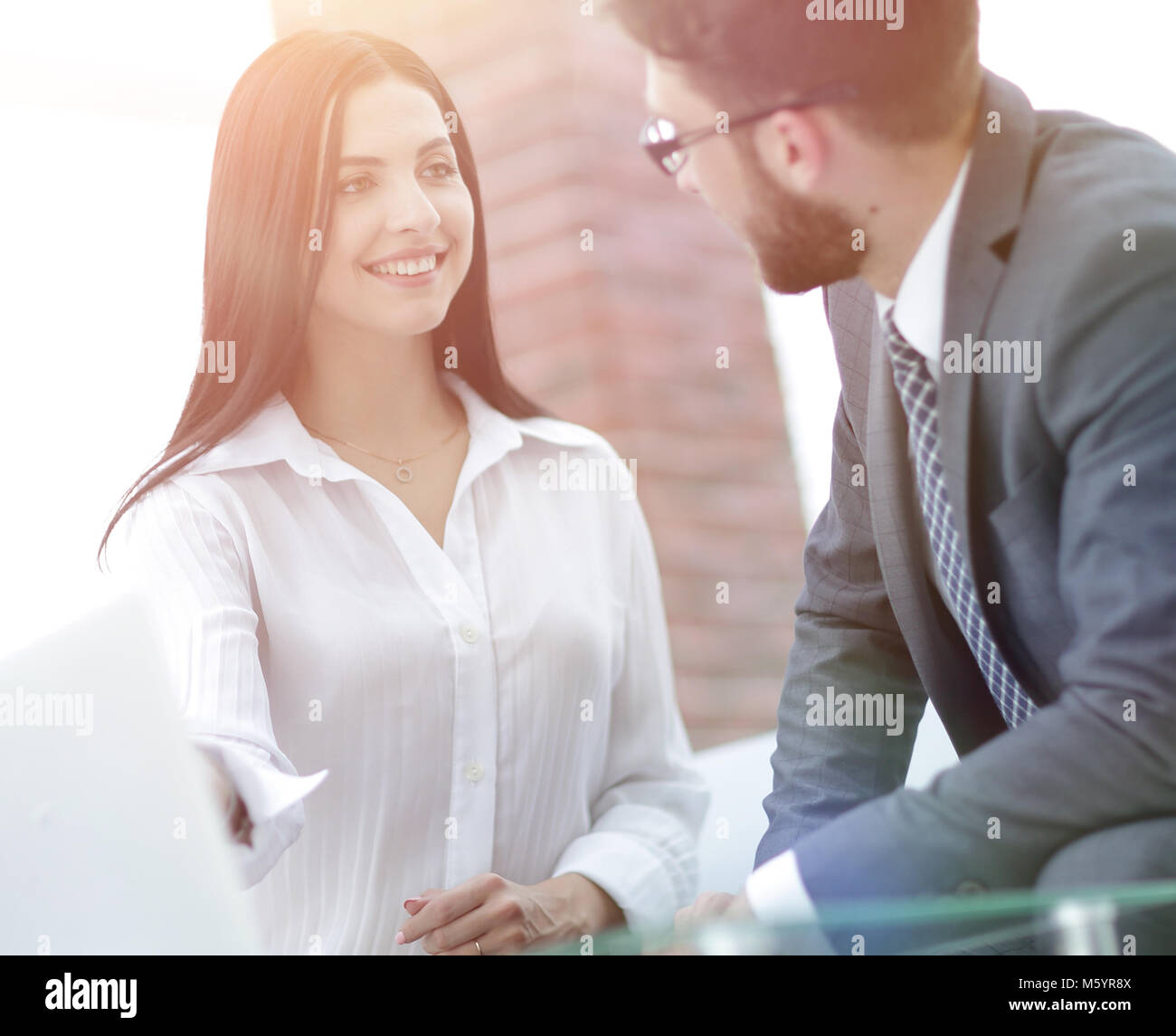 close-up of company employees communicating in the office Stock Photo ...