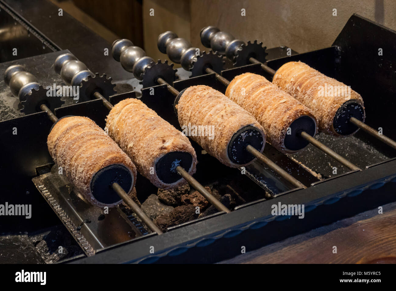 Prague, Czech Republic - October 9, 2017: Warm Trdelnik, a traditional ...