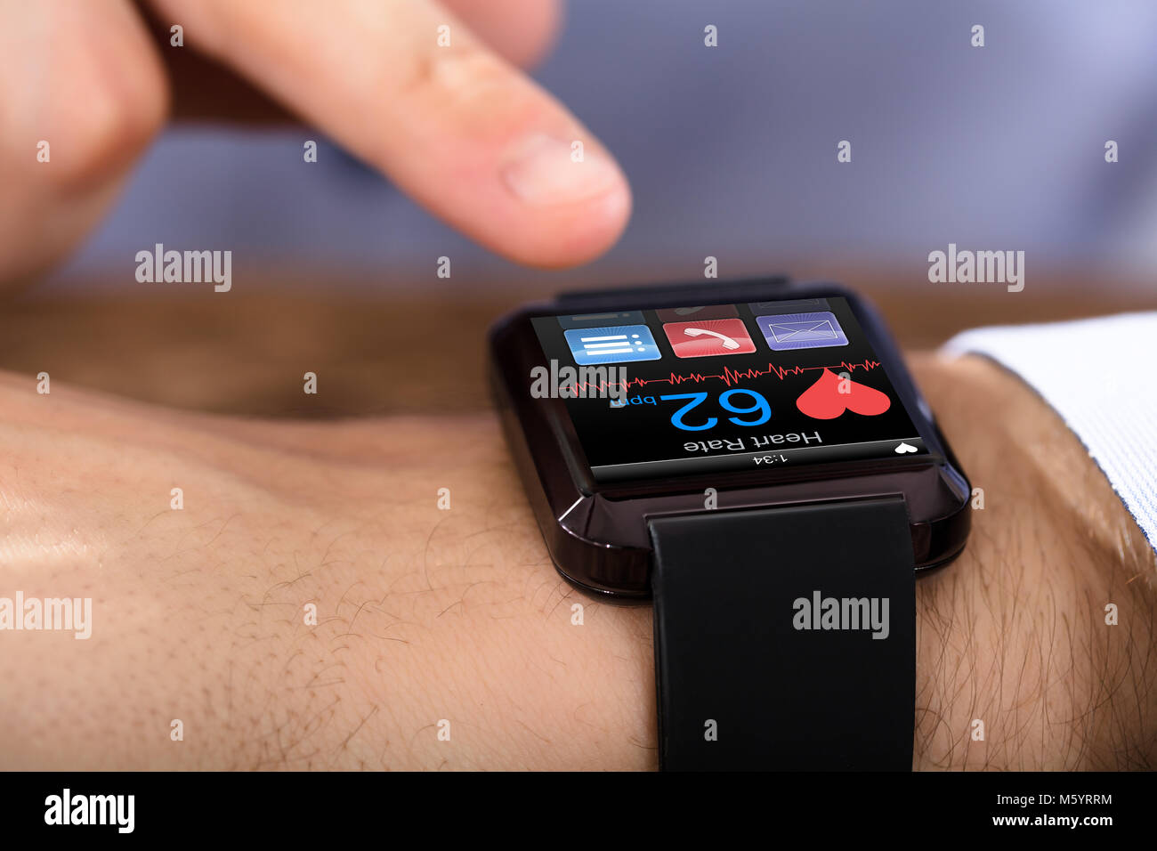 Person Hand Wearing Smart Watch Showing Heartbeat Rate Stock Photo - Alamy