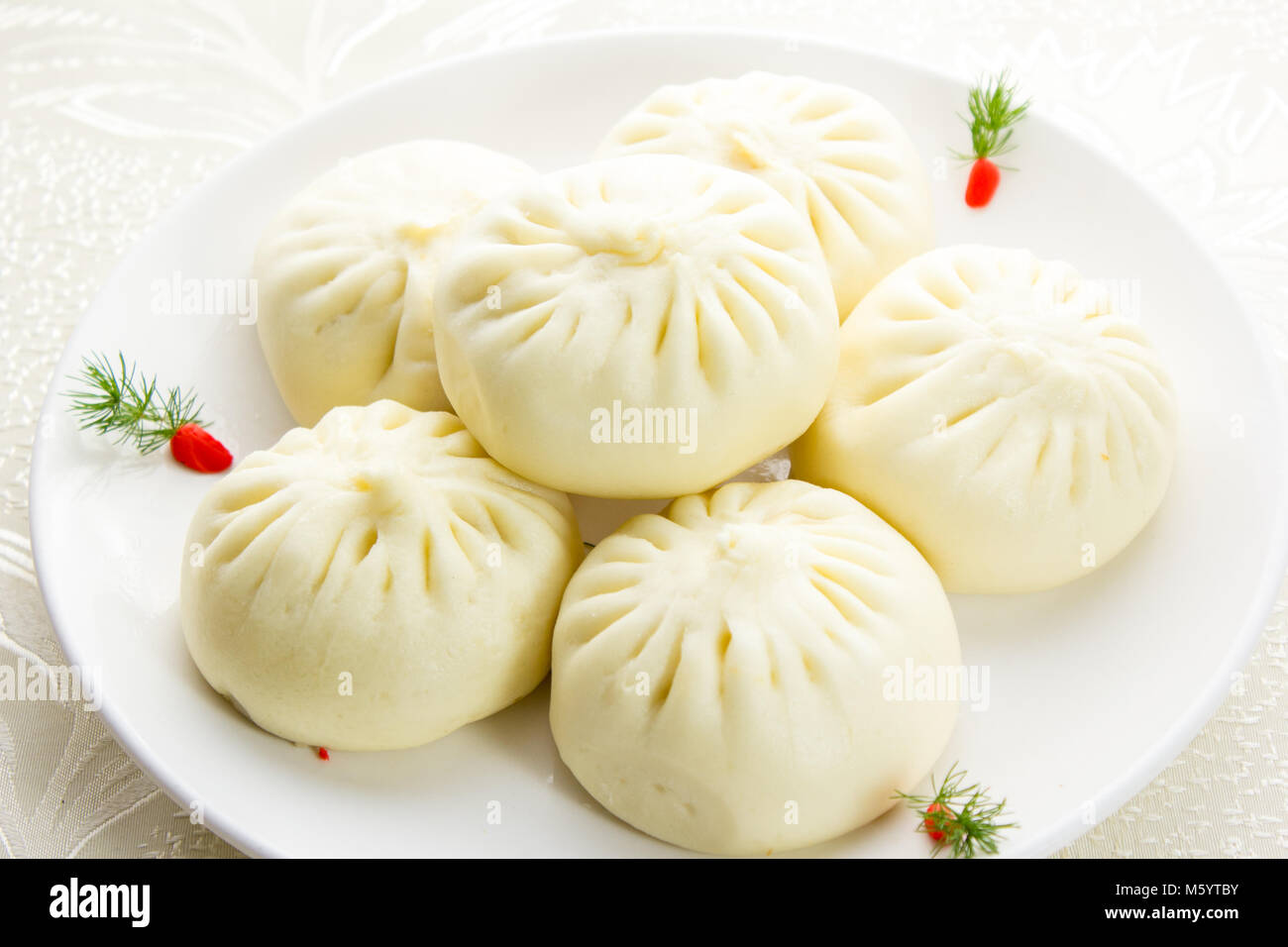 The steamed stuffed bun, North China snacks Stock Photo - Alamy