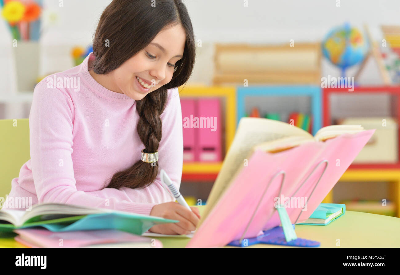 schoolgirl doing homework Stock Photo - Alamy