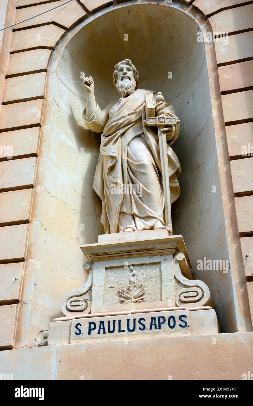 Statue of St Paul in an alcove on the front of the Parish church of our ...