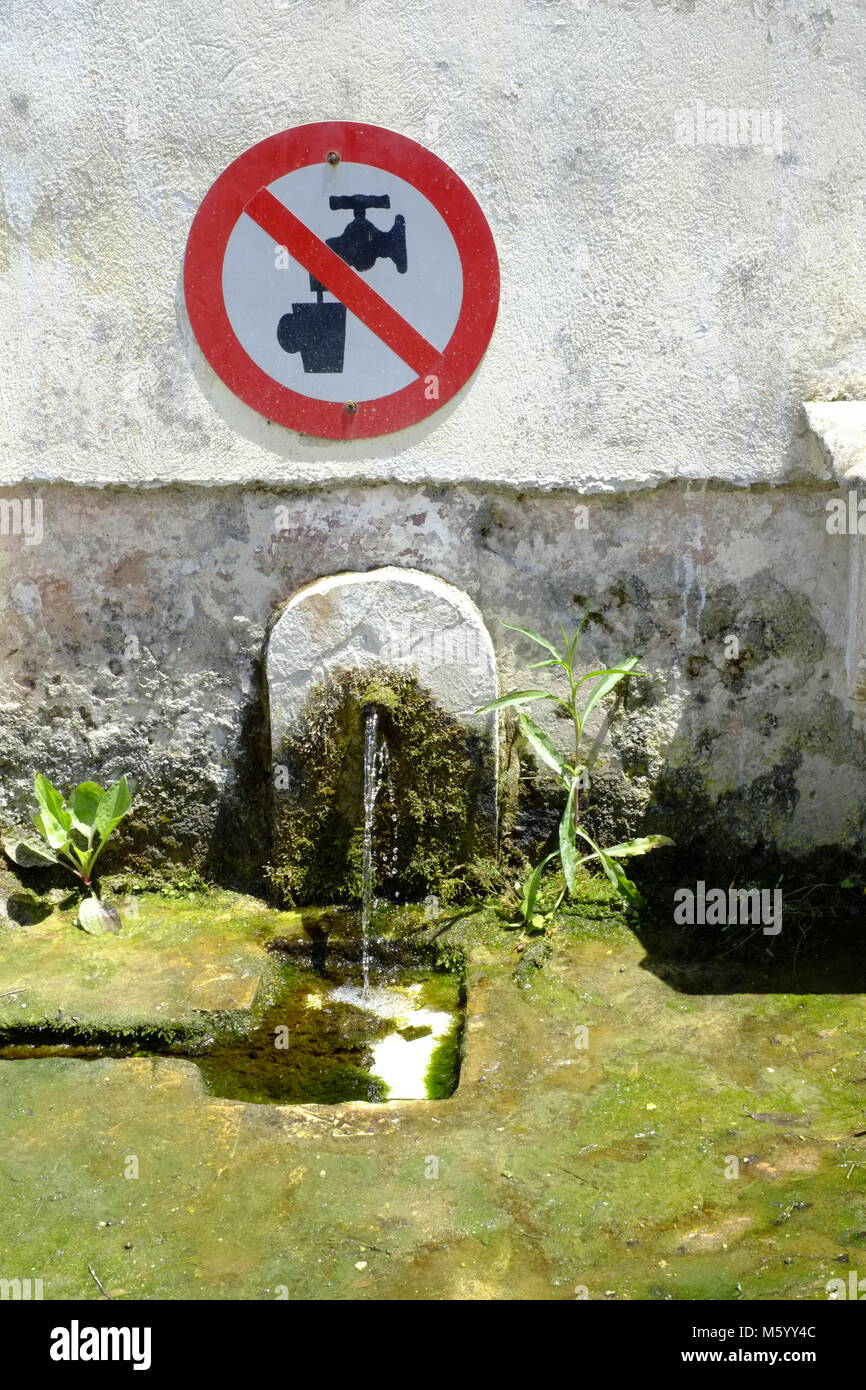 Communal water tap hi-res stock photography and images - Alamy