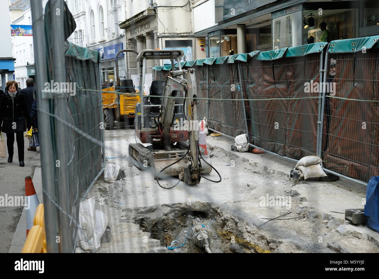 Digging up the street Stock Photo - Alamy