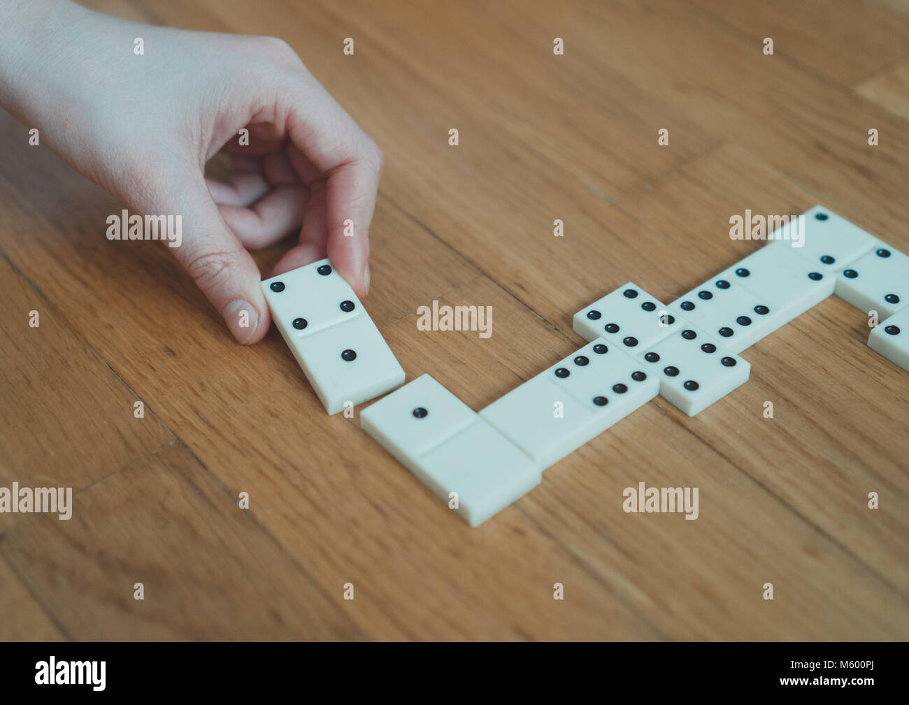 Dominoes child hi-res stock photography and images - Alamy