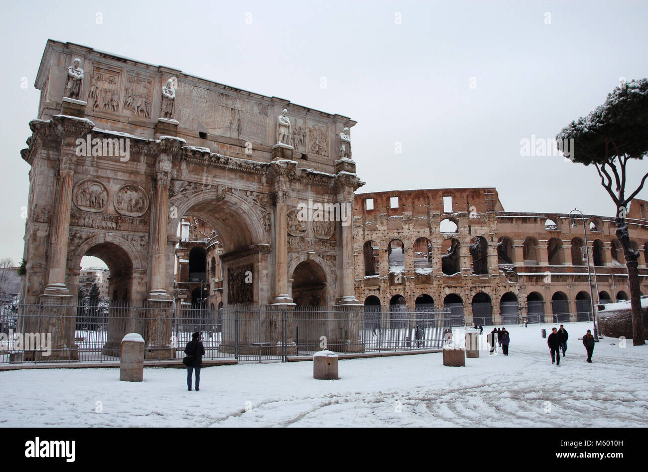 Coliseum and Arch of Constantine covered by snow, a very rare event for ...