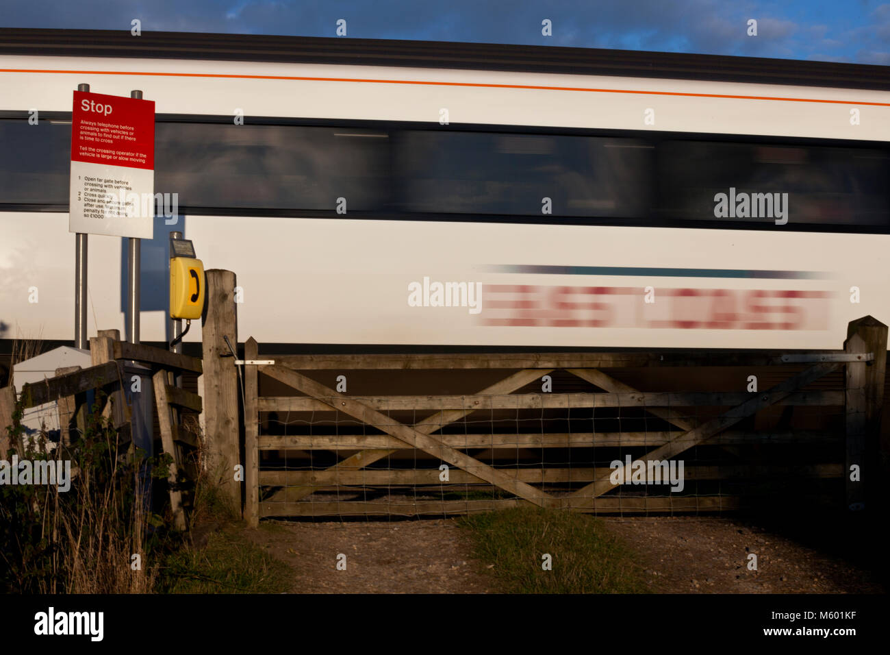 East coast train passing a farmers occupation crossing. This was during ...