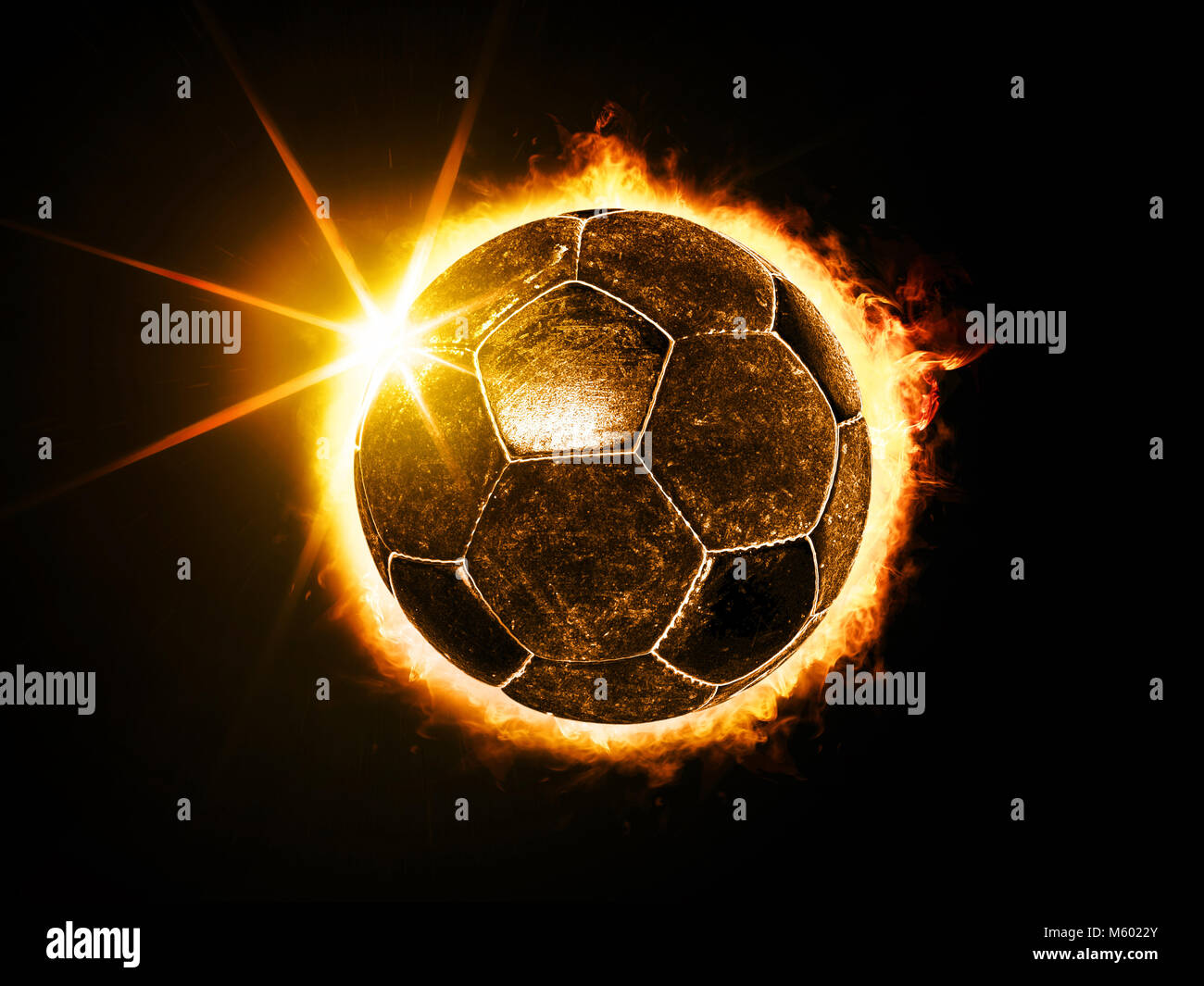 3D illustration of fiery soccer ball like solar eclipse on black ...