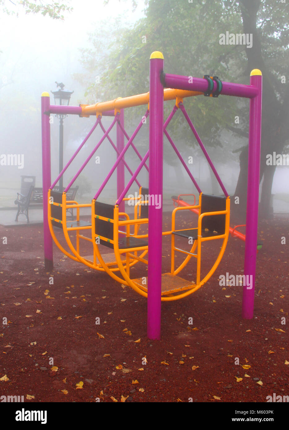 Playground in fog Stock Photo - Alamy