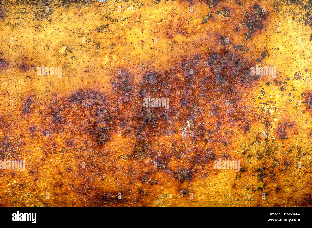 Abstract image of rusty yellow metal surface Stock Photo - Alamy