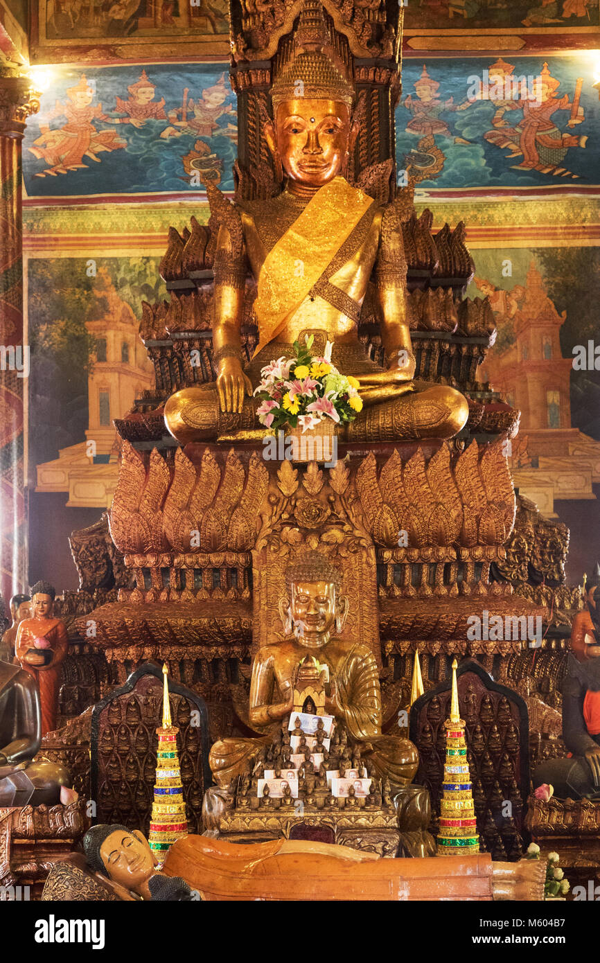 Buddhism - golden Buddha statue in Wat Phnom buddhist temple, Phnom ...