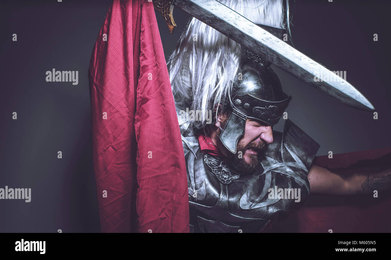 Strength Roman gladiator, wrestler and warrior of Rome with helmet and ...