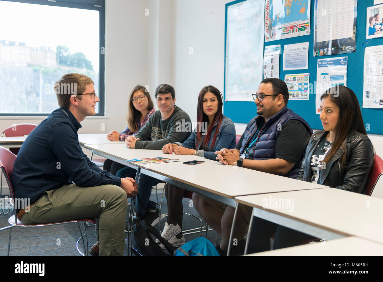 real overseas students learn english at college in the classroom and ...