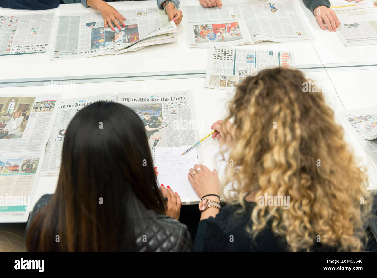 Student reading newspaper classroom hi-res stock photography and images ...
