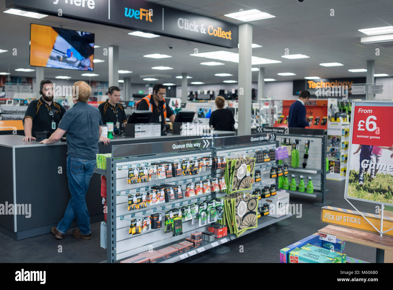 inside the retail store of a halfords shop on a retail estate selling ...