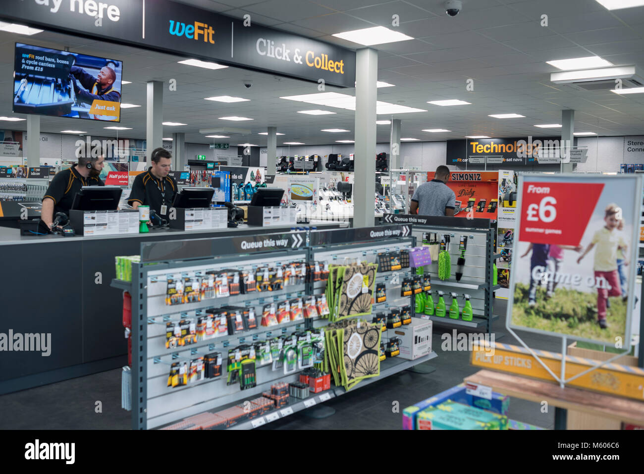 inside the retail store of a halfords shop on a retail estate selling ...