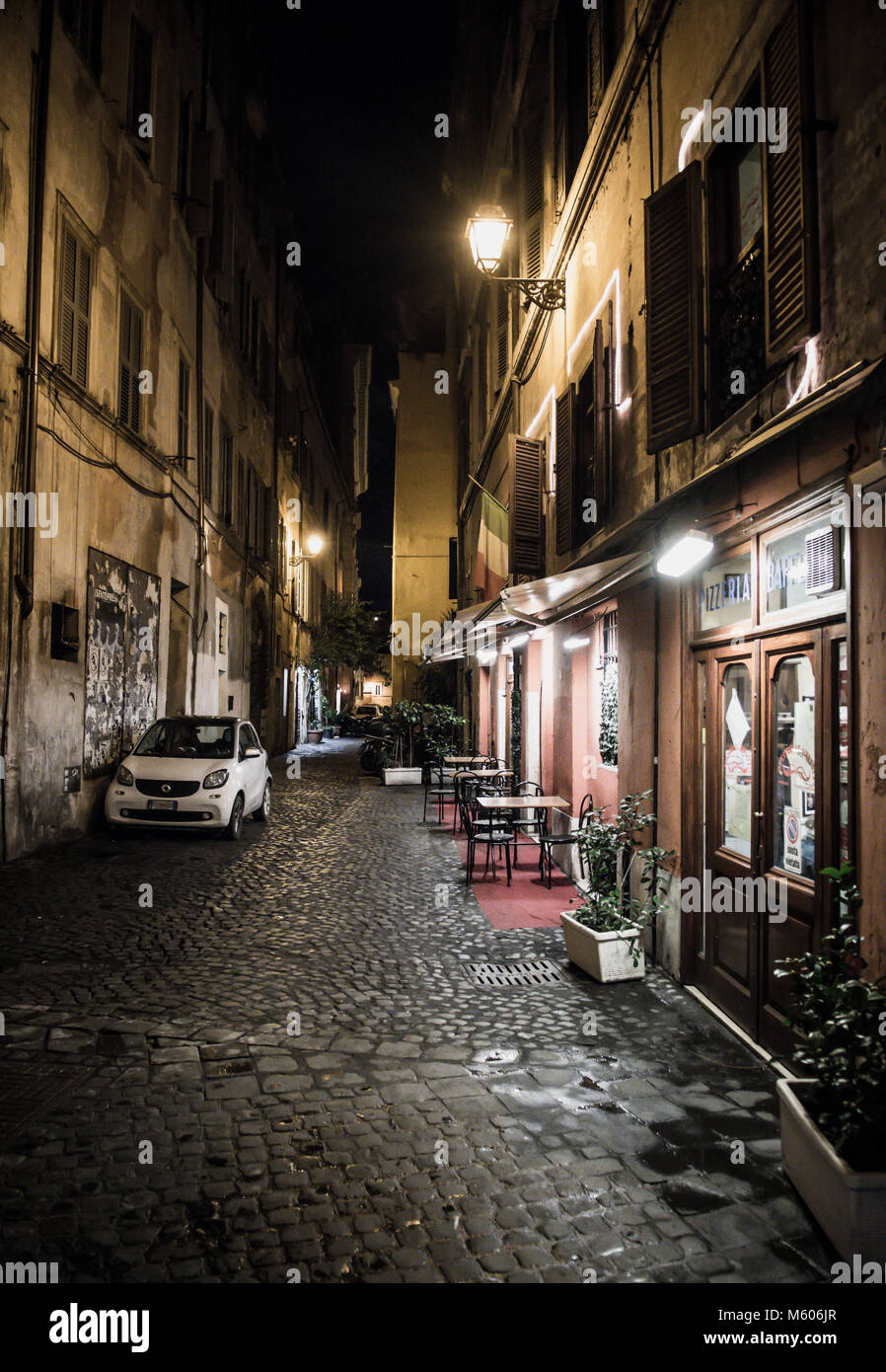 Pizzeria in Abandoned Street at Night in Rome in Italy Stock Photo - Alamy