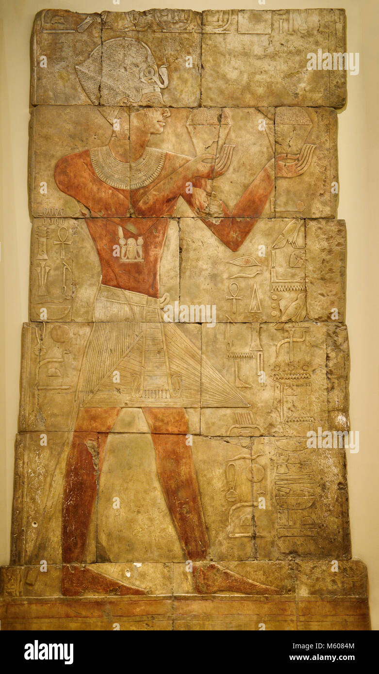 Military pharaoh Thutmose III offering two containers of incense to the ...