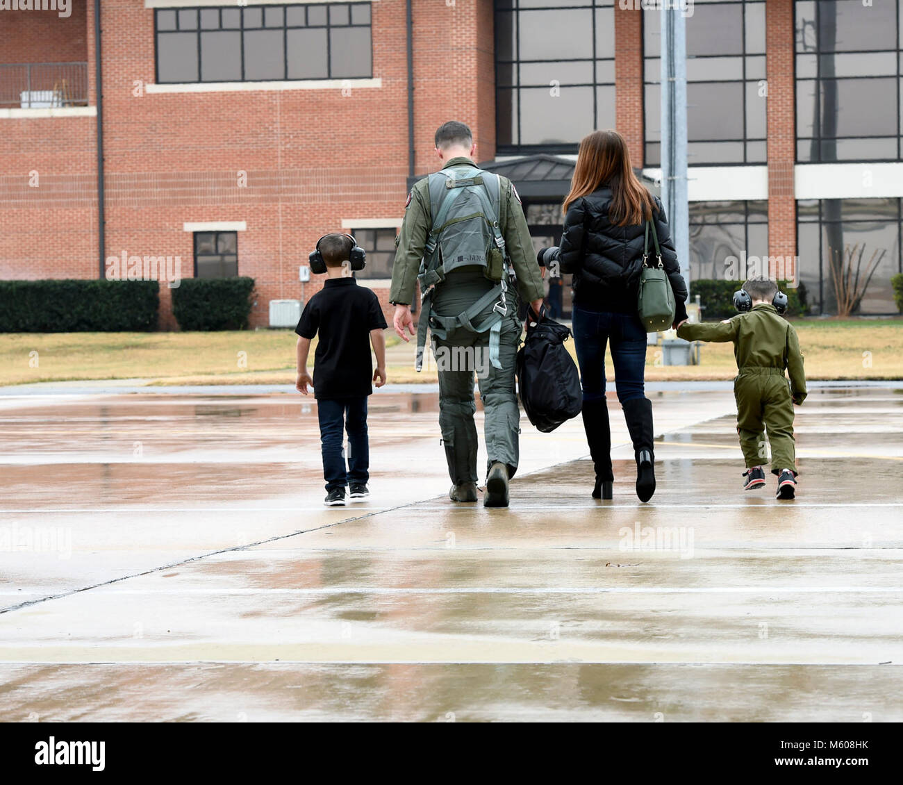 The Turner family walks back to the 149th Fighter Wing’s Operations ...