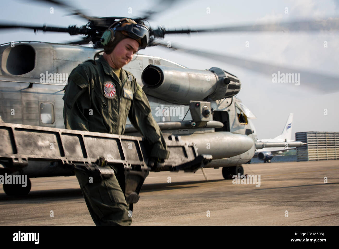 A U.S. Marine with Marine Heavy Helicopter Squadron 466 ‘Wolfpack ...
