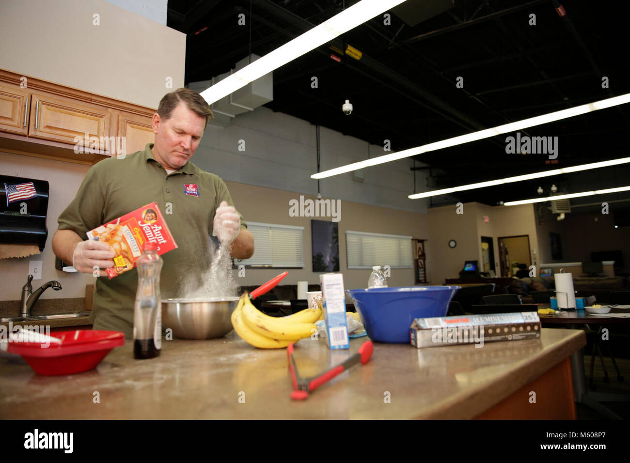 Albert (A. J.) Jacobs, coordinator, Single Marine Program, prepares ...
