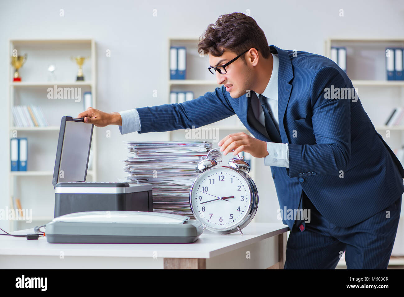 The businessman making copies in copying machine hi-res stock ...