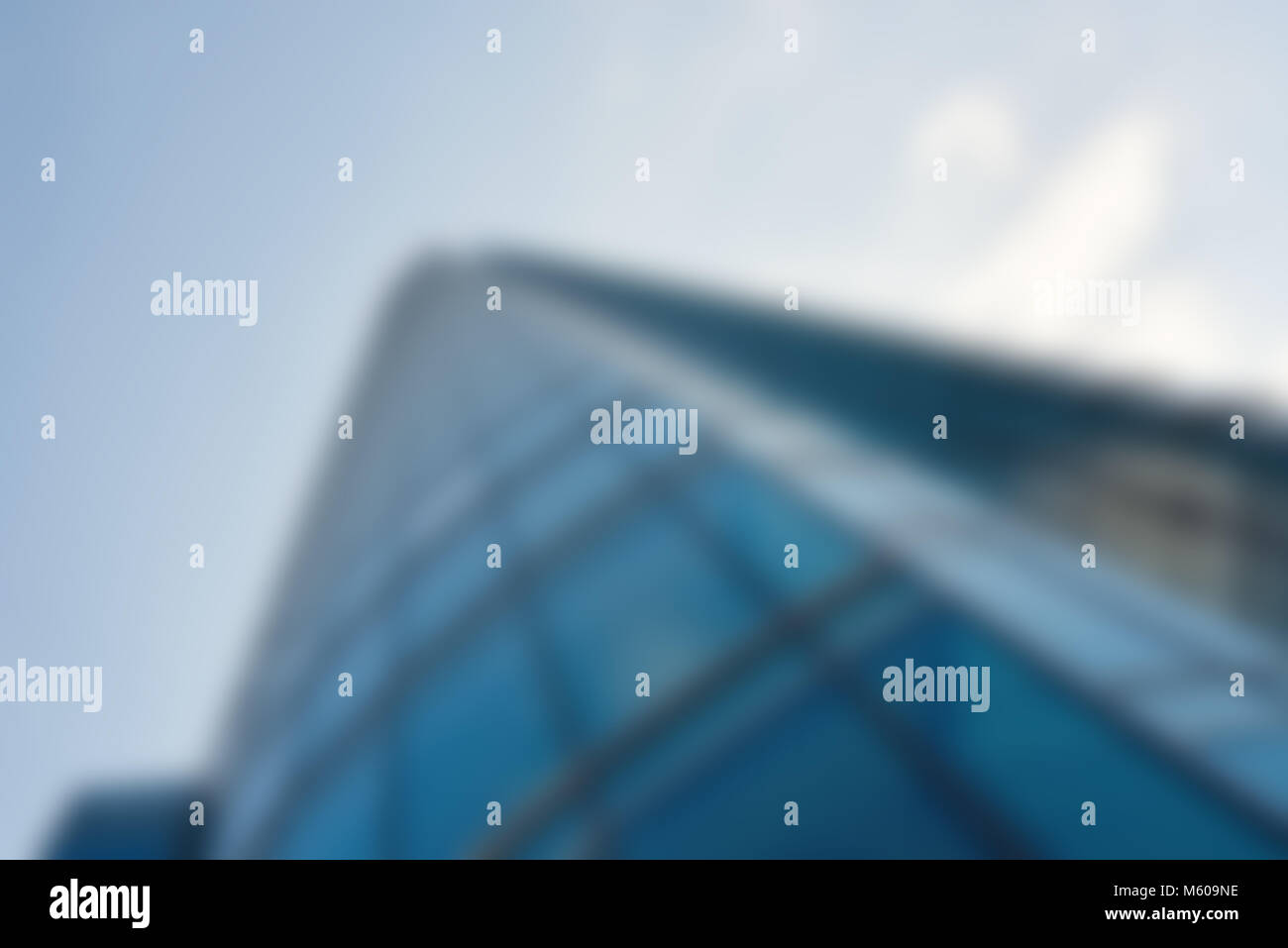 Blurred image of modern glass skyscraper rising up Stock Photo - Alamy
