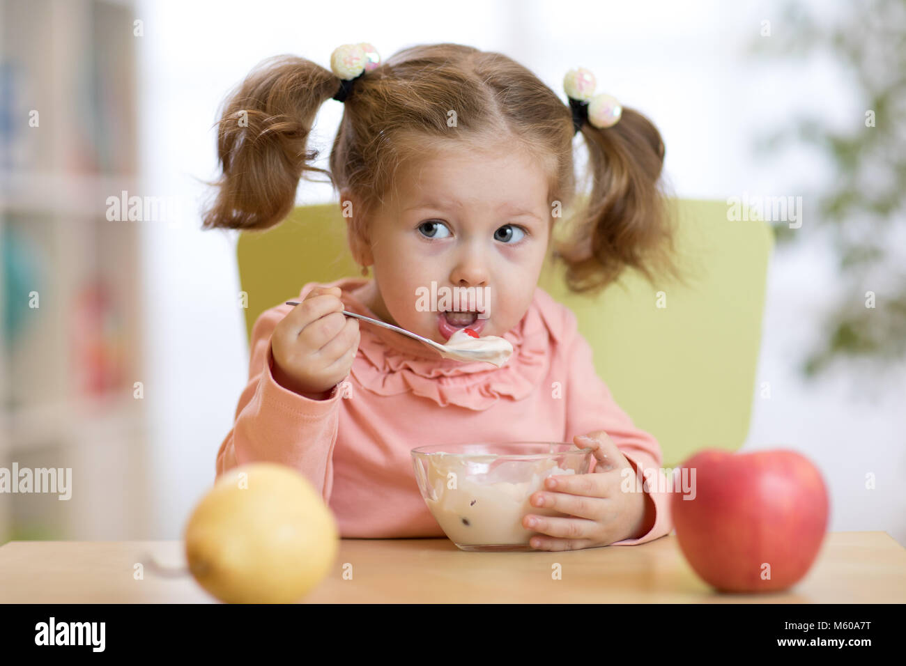 kid eating healthy food at home or kindergarten Stock Photo - Alamy