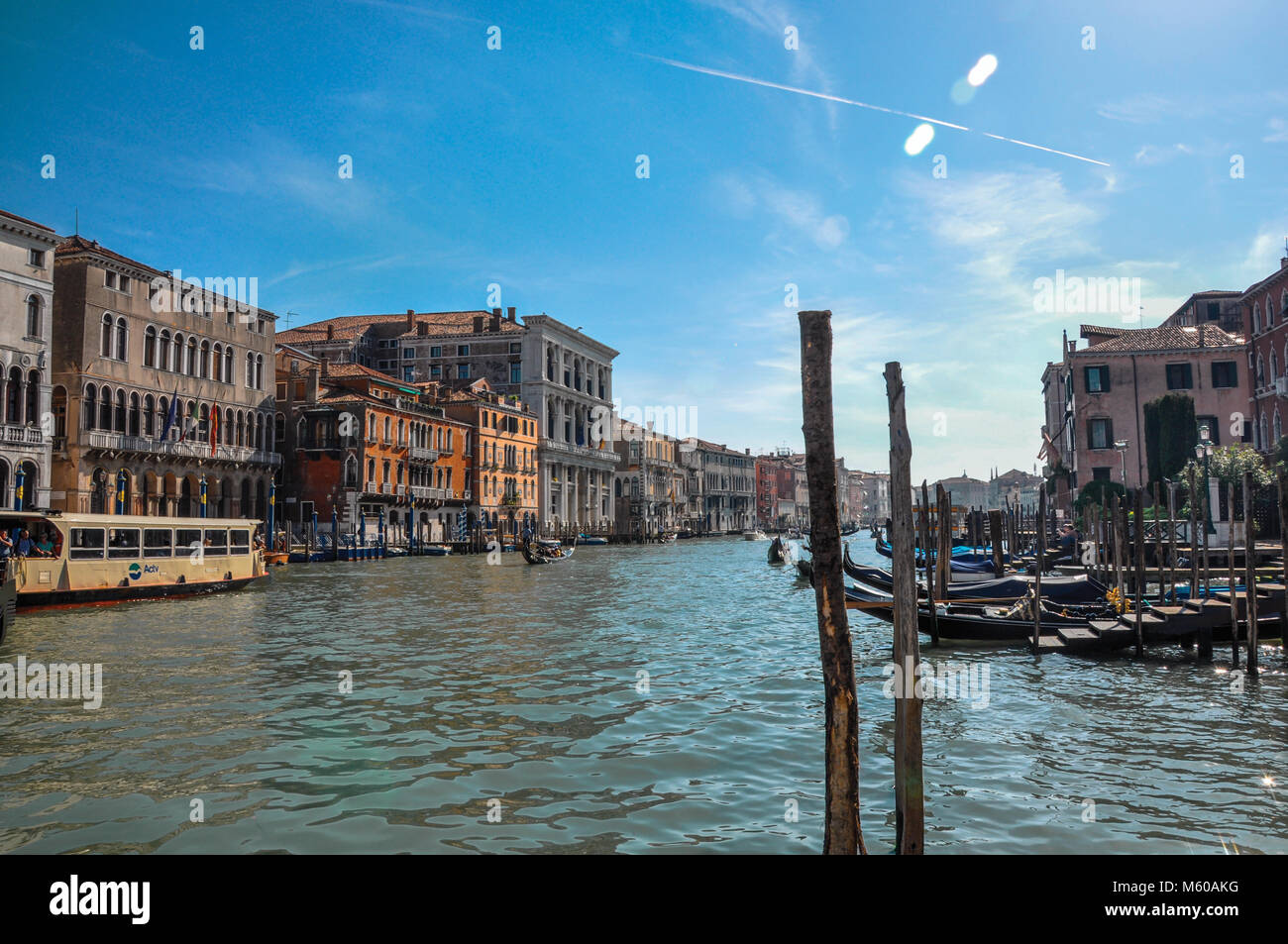 Venice, Italy. View of buildings, piers and gondolas in front of the ...