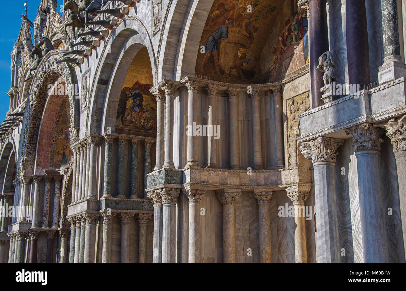 Venice, Italy. Columns, arches made of various types of marble on the ...